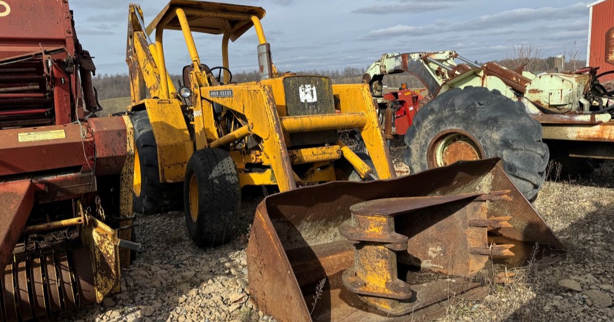 Used JD 500C tractor loader backhoe at Baker and Sons Equipment